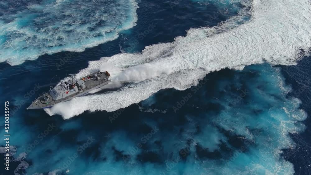 Navy ship in action sailing in Full speed, aerial view The Idf Dabur is ...