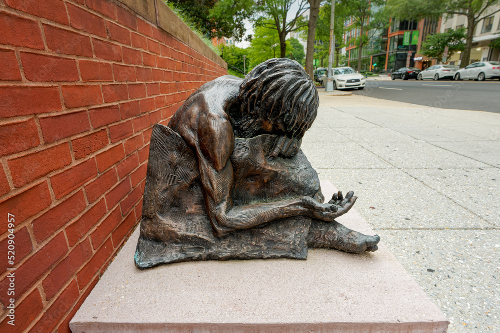 Washington, DC, USA - June 26, 2022: This statue depicting homeless ...