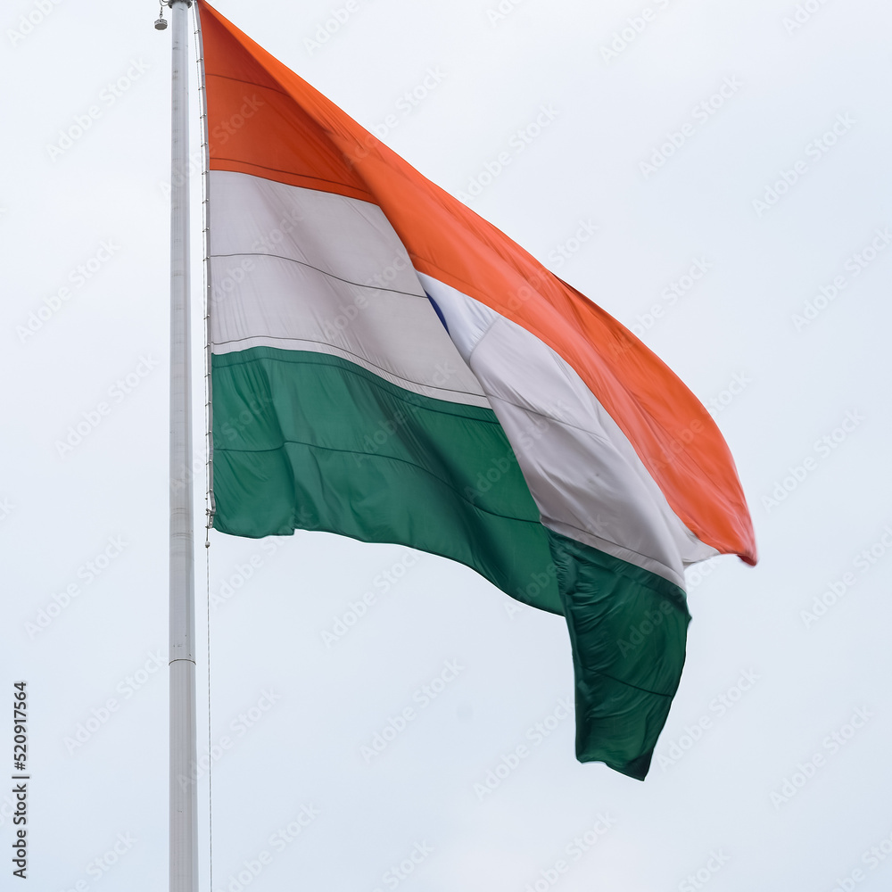India flag flying high at Connaught Place with pride in blue sky, India ...