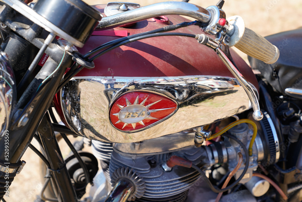 BSA logo sign and text brand on vintage red tank of motorcycle Classic ...