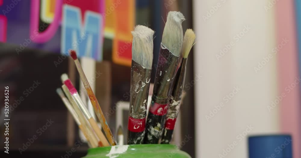 Close up of various paint brushes in different sizes and shapes in art ...