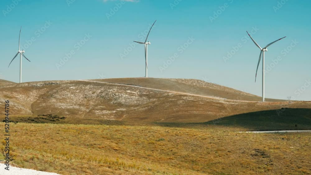 wind power generation. Renewable Green energy. Rotating propellers. The ...