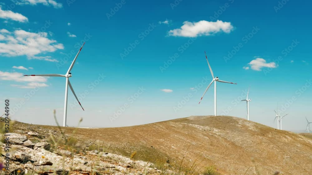 wind power generation. Renewable Green energy. Rotating propellers. The ...