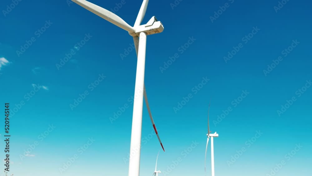 wind power generation. Renewable Green energy. Rotating propellers. The ...