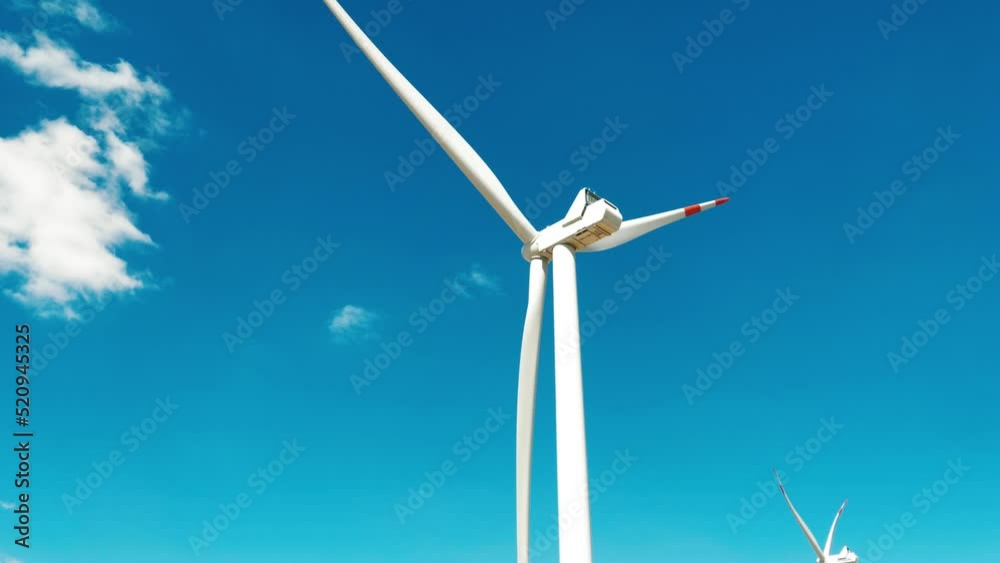 wind power generation. Renewable Green energy. Rotating propellers. The ...