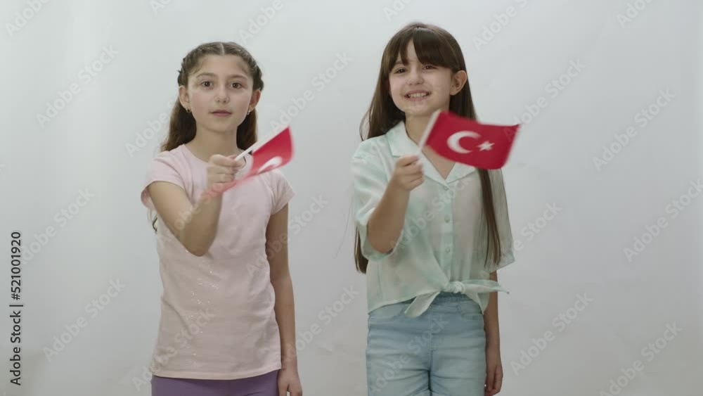 Smiling little girls isolated on white background celebrating with ...