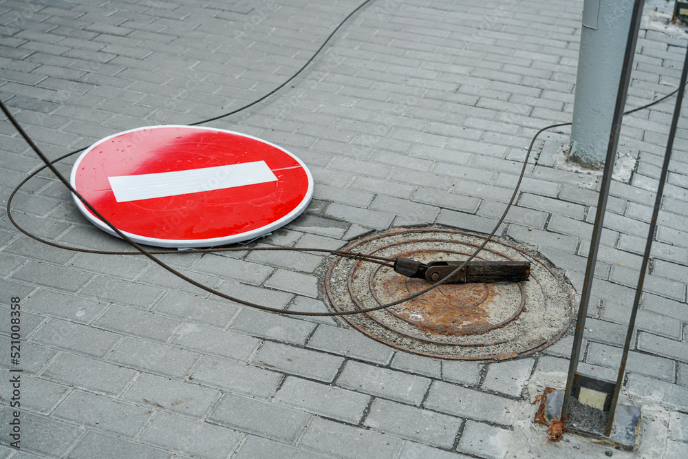The road sign has fallen. The road sign is broken. Road. No travel ...