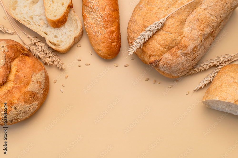 Bread background. Fresh white wheat bread, round classic, ciabatta ...