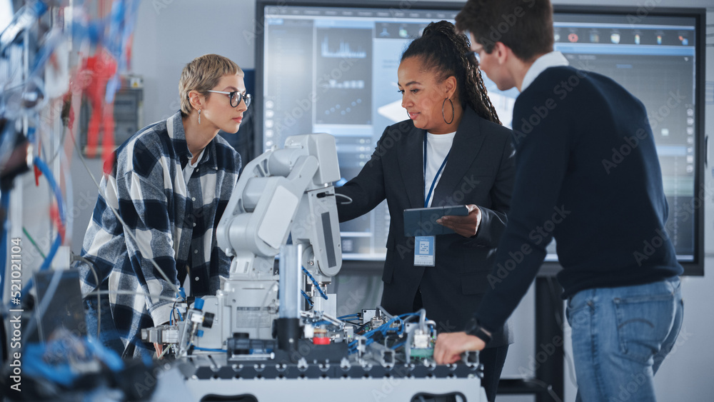 University Robotics Class: Black Teacher Explaining Engineering to ... University Robotics Class: Black Teacher Explaining Engineering to ...