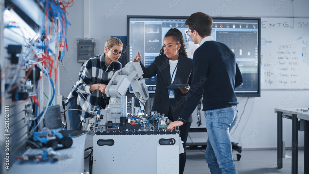 In Robotics Development Laboratory: Black Female Teacher and Two ...
