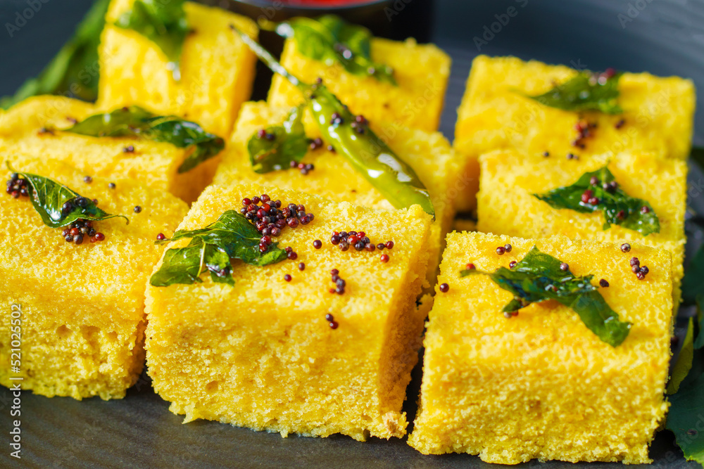 Famous vegetarian Gujarati dish "Dhokla" is ready to serve. Stock Photo ...