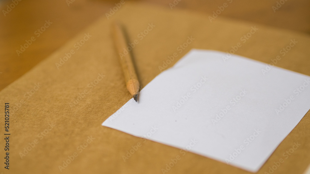 Pencil marking plan on white paper with pencil close up. Checklist plan ...