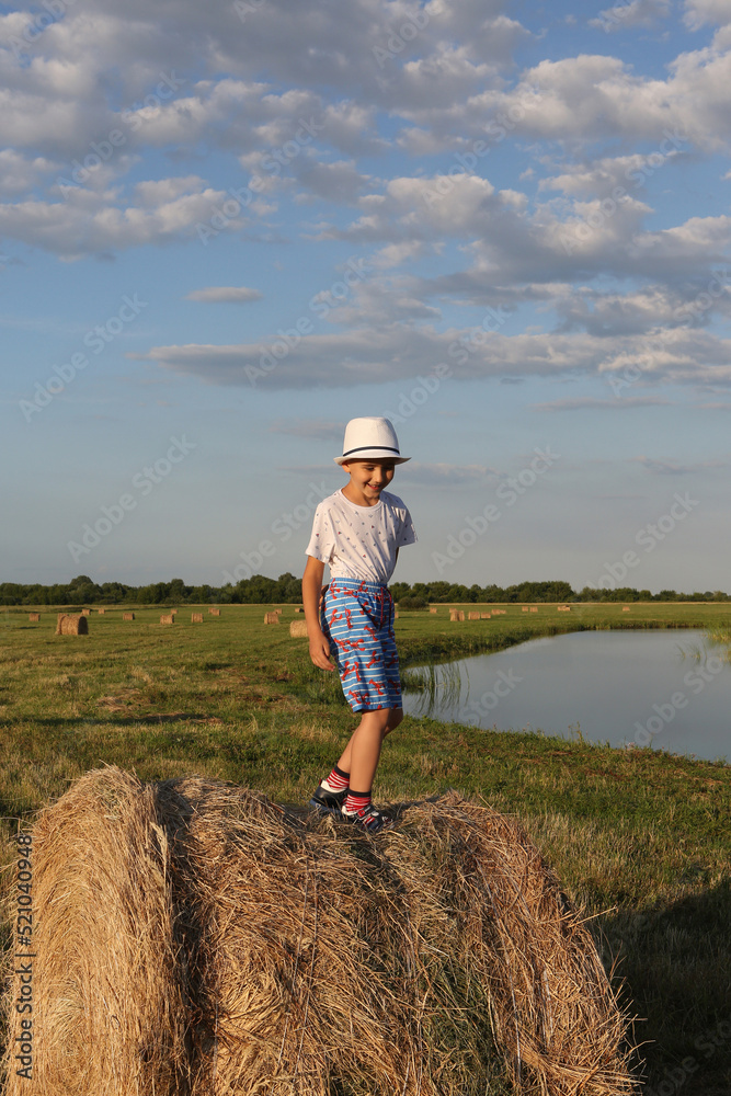 Russian tourist child, fashion kid, cute boy in village in Russia ...