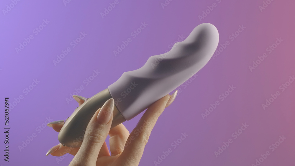 Woman Holds Sex Toy Creative Womans Hand Holds Vaginal Sex Toy