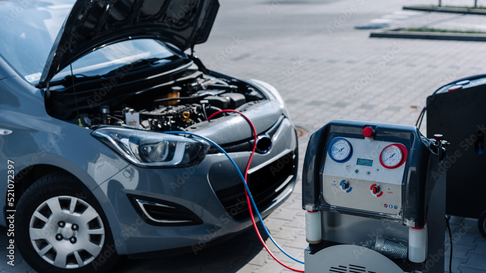 Car air conditioning ac repair service. Refill automobile ac compressor ...