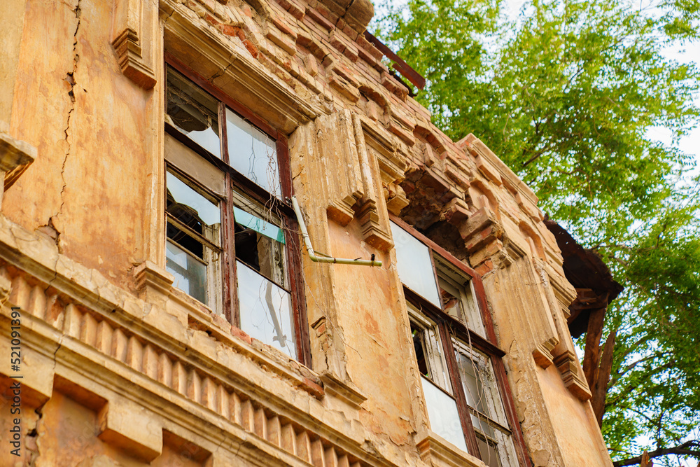 ruins. an old ruined building. broken glass in the windows. Stock Photo ...