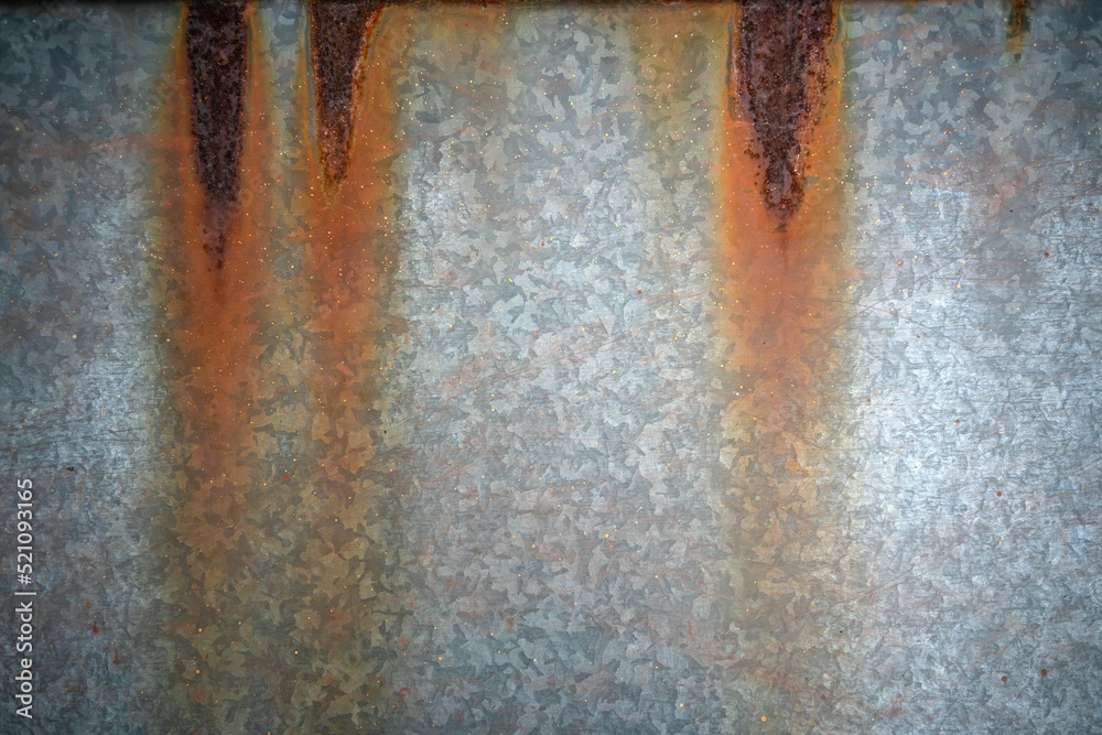 Rusty water stains on the metal.Metal corrosion, a clean place for text ...