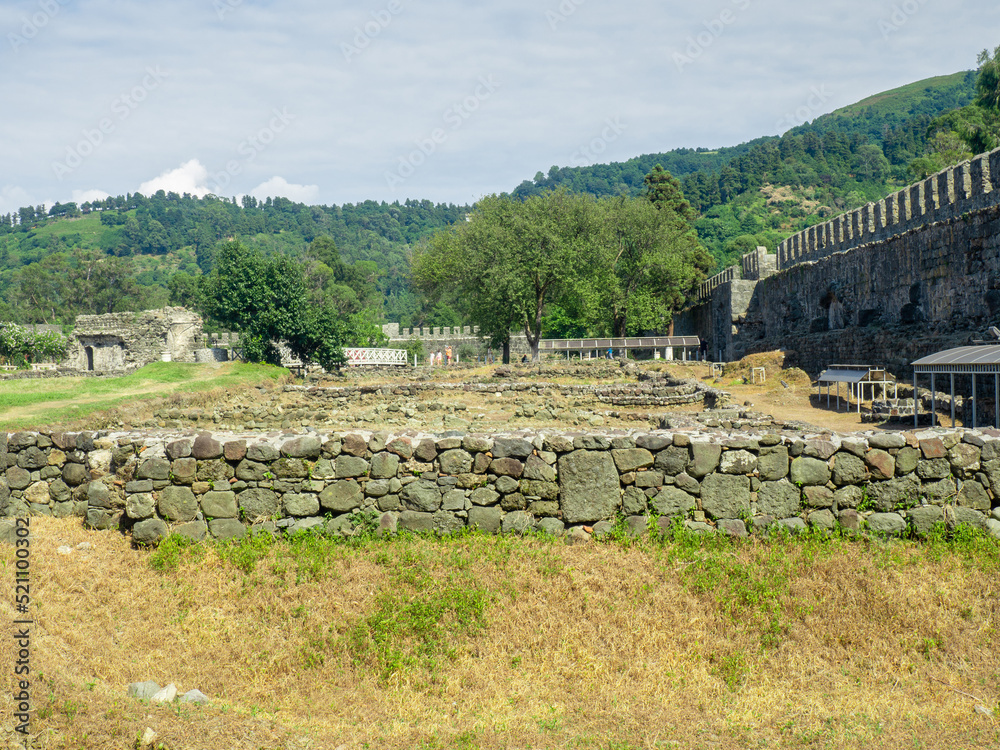 The foundation of an ancient building. Archeology. Ruins of an ancient ...