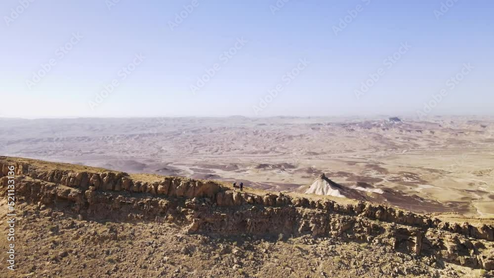 A zoom out shot of mountain landscape, desert. A panoramic view of ...