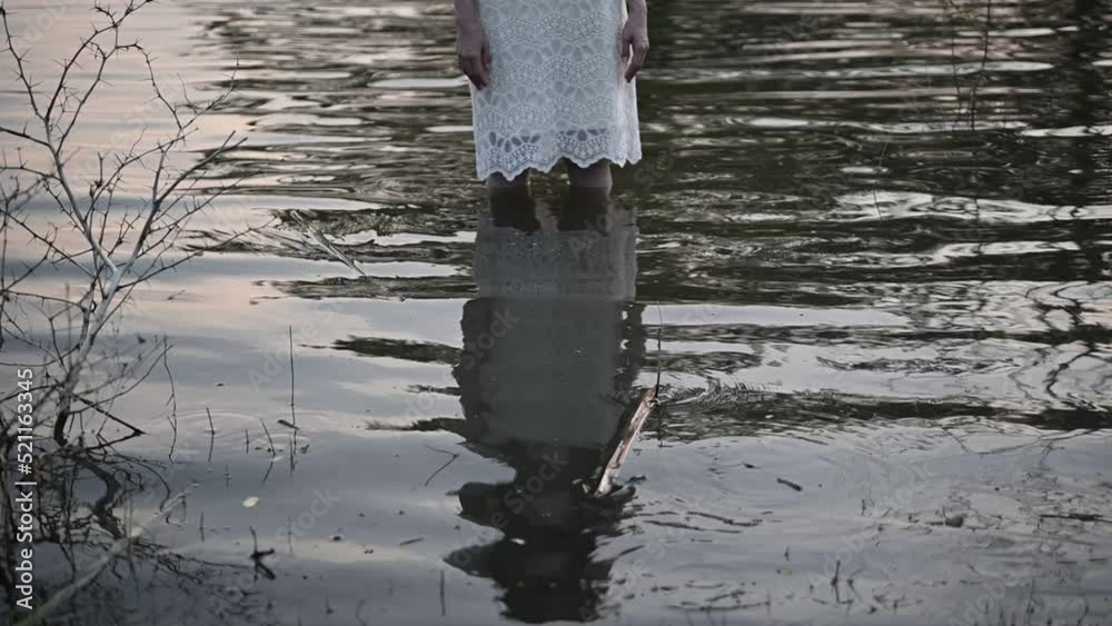 Portrait of asian woman make up ghost face at the swamp,Horror in water ...
