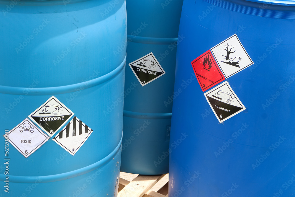 Warning symbol for chemical hazard on chemical container Stock Photo ...