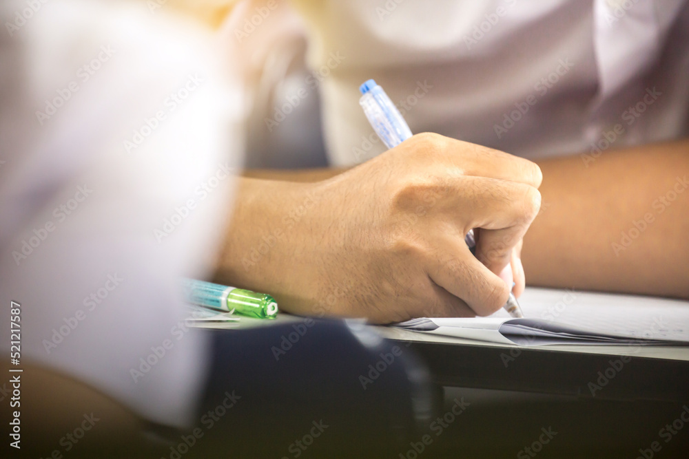 high school,university student study.hands holding pencil writing paper ...
