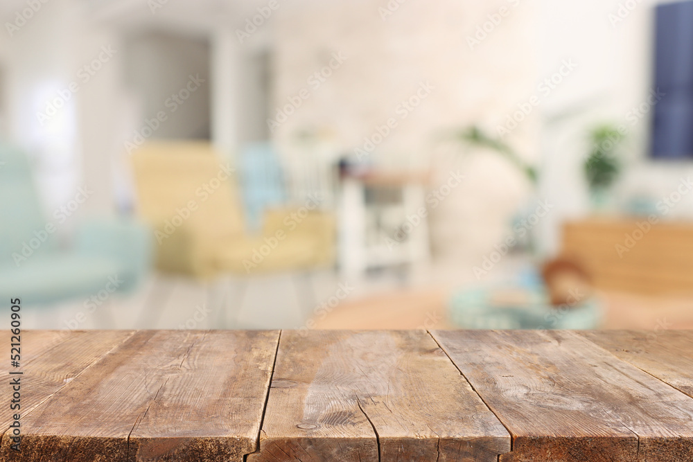 Wooden empty table in front of Living room interior. For product ...