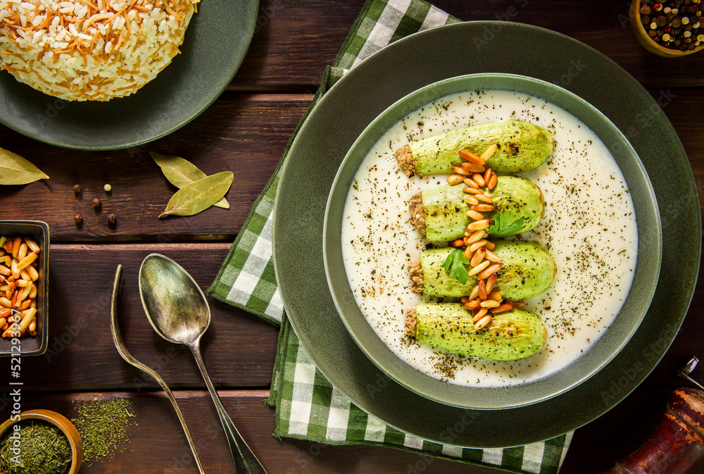 Arabic Cuisine; A delicious Lebanese stuffed zucchini in tangy garlic ...