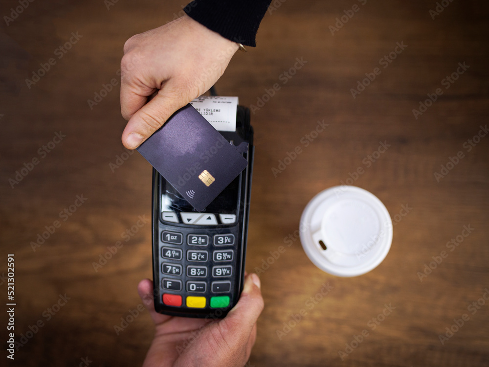 hand holding with mobile phone, contactless payment, payment by credit ...