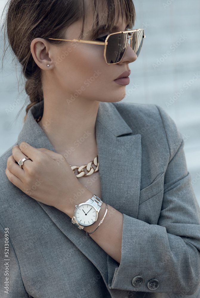 Beautiful stylish white watch on woman hand. Portrait of beautiful ...