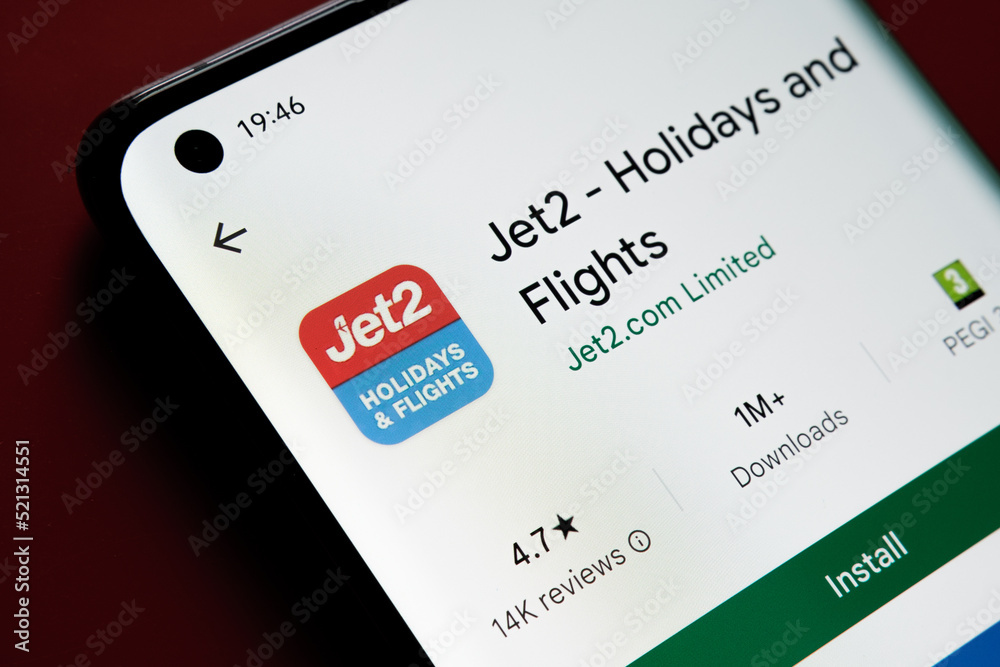 Jet2 app seen in Google Play Store on the smartphone screen placed on ...