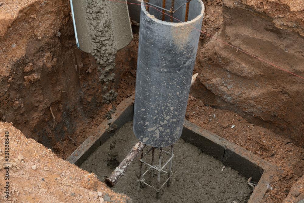 Stone cement mix that is poured onto the blocks. pillar base for ...