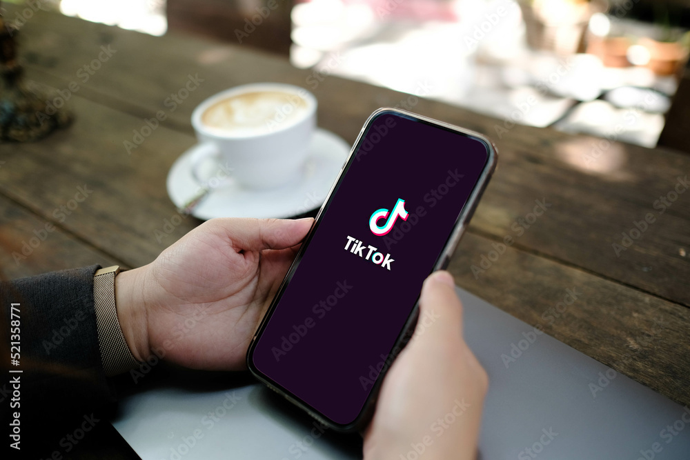 NBangkok. Thailand. AUGUST 5,2022 : woman using iPhone XS showing Tik ...