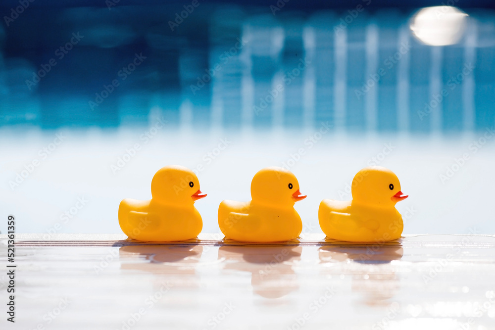 Summer season, the concept of a children's game. Little rubber yellow ...