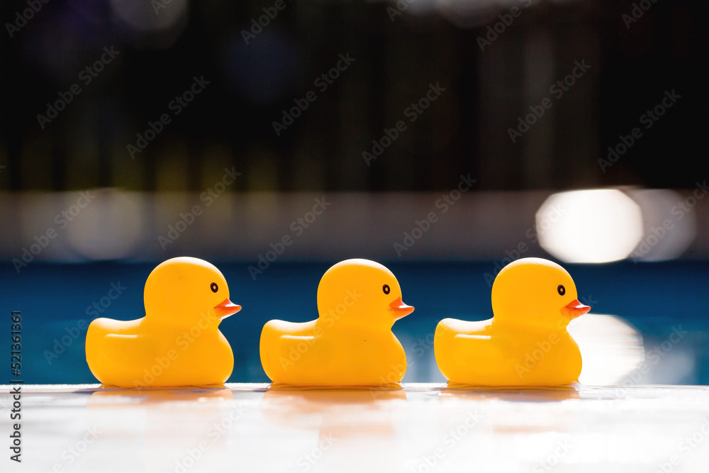 Summer season, the concept of a children's game. Little rubber yellow ...