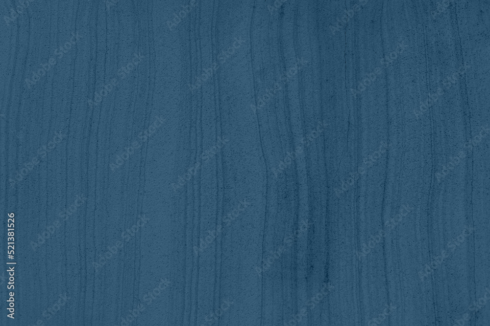 Saturated dark blue colored low contrast Concrete textured background ...