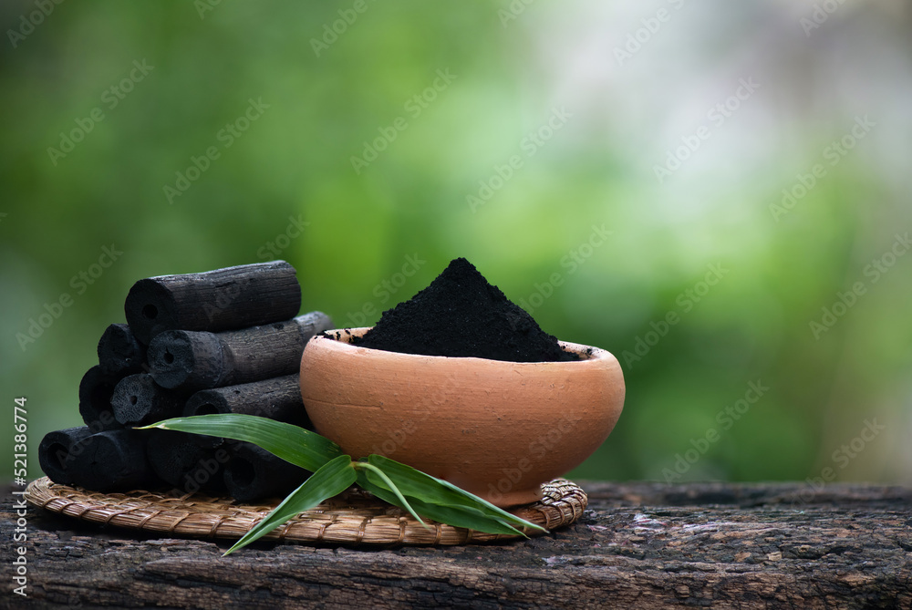 Bamboo charcoal on nature background. Stock-Foto | Adobe Stock