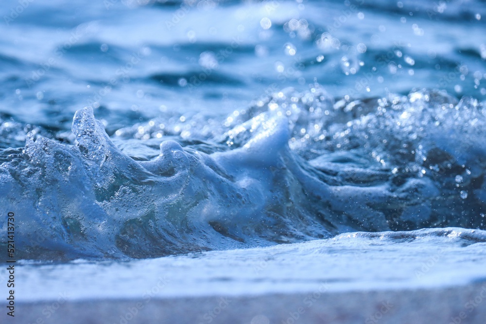 Sea wave rolling on the beach. Stock Photo | Adobe Stock