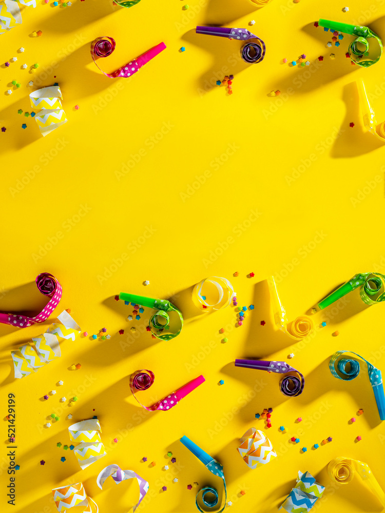 Abstract colored party background. Multi-colored party horns ...