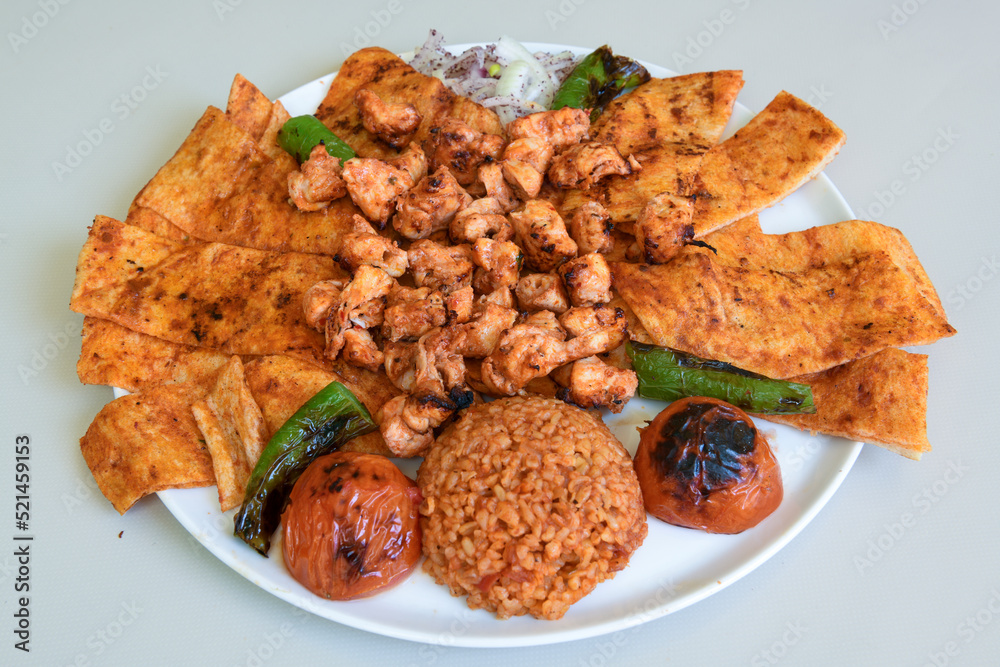 Chicken wings barbeque in a dish with BBQ grill sauce . Izgara tavuk ...