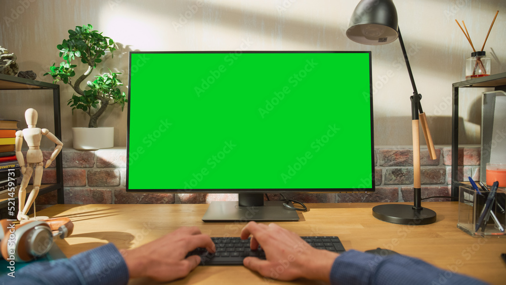POV First Person View of a Man Working on Desktop Computer with Green ...