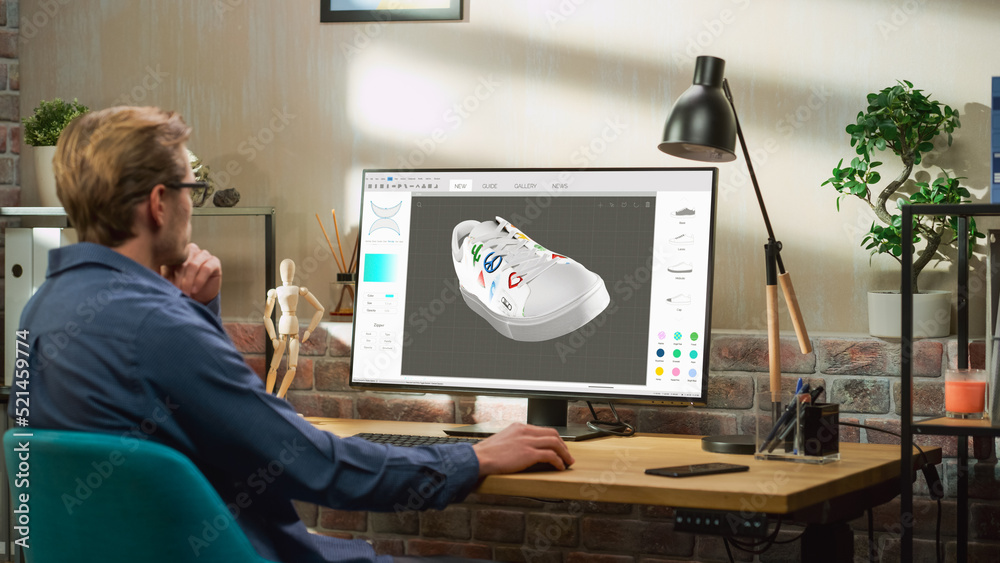 Young Male Footwear Designer Works on 3d Model of Shoe and Change ...