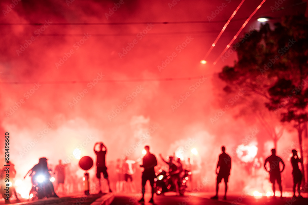 Red Star Football fans with torches and flags marching on streets and ...