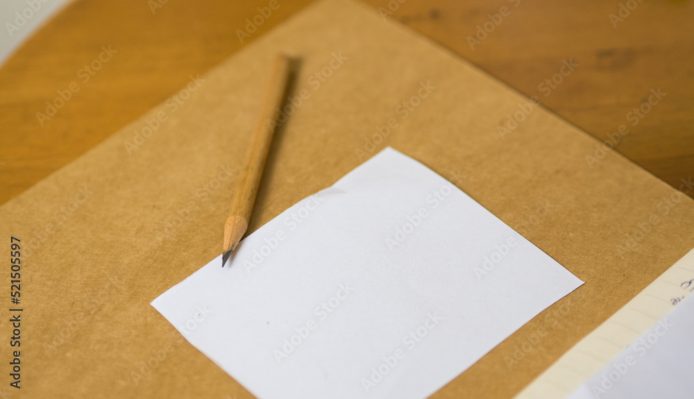 Pencil marking plan on white paper with pencil close up. Checklist plan ...