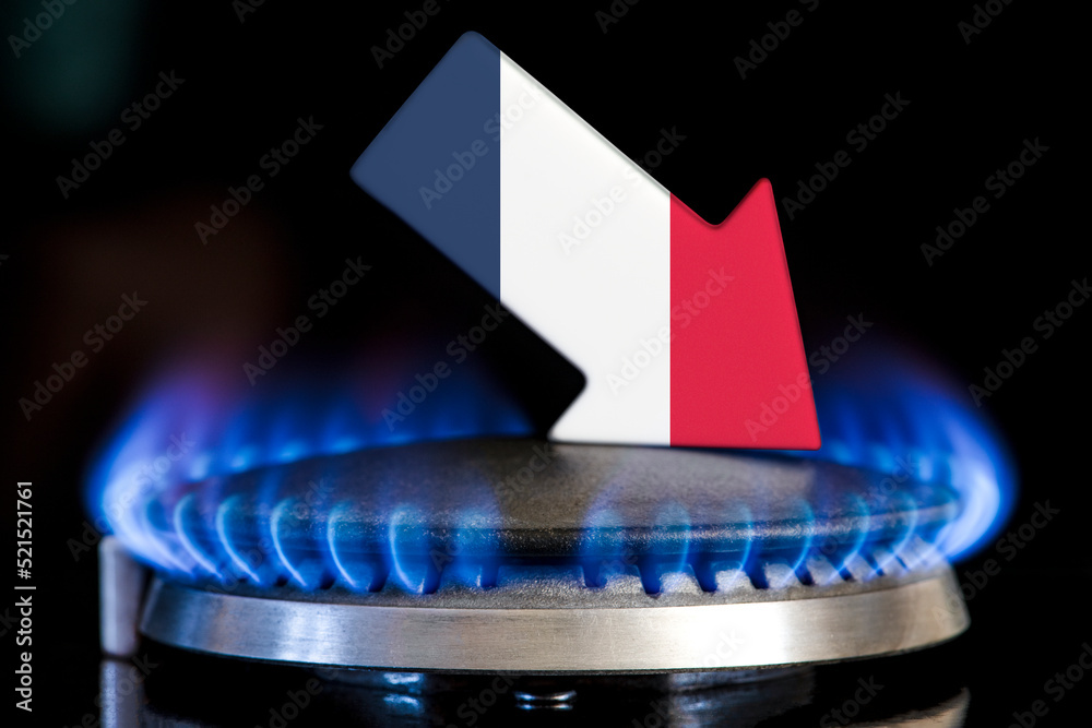 Decreased gas supplies in France. A gas stove with a burning flame and ...