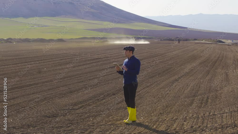 Tractor agrochemical Agricultural spraying. Modern farmer tablet use ...