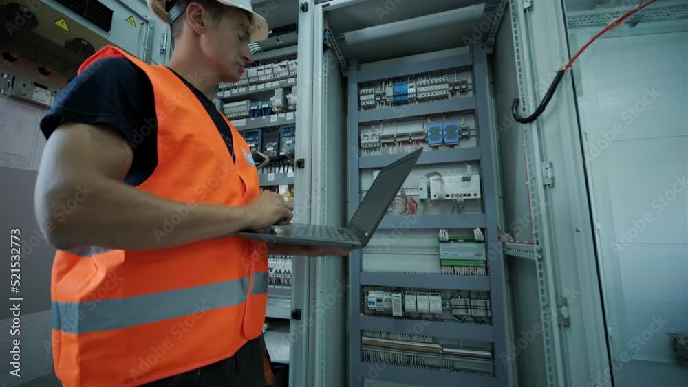 Electrical engineer working check the electric current voltage and ...