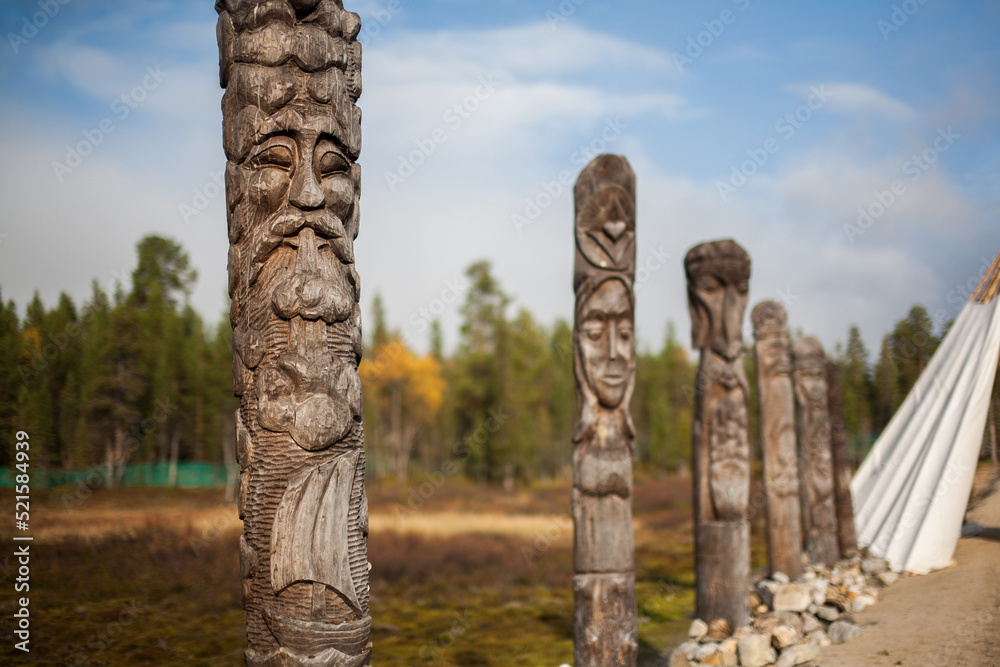 Alley of majestic idols at Sami Village, Murmansk, Russia, the four ...