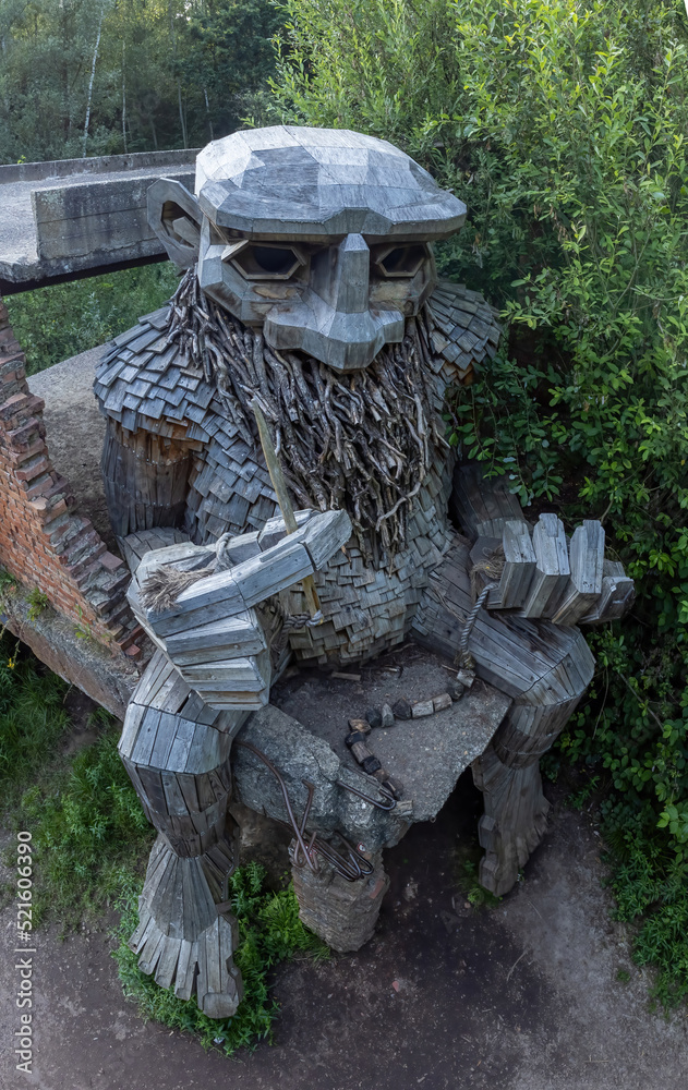 Giant wooden troll sculpture named Hannes by Thomas Dambo sitting in ...