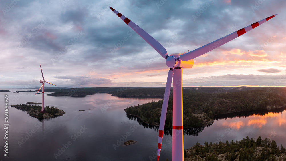 Windmills near lake. Wind turbines with beautiful sky. Windmills ...